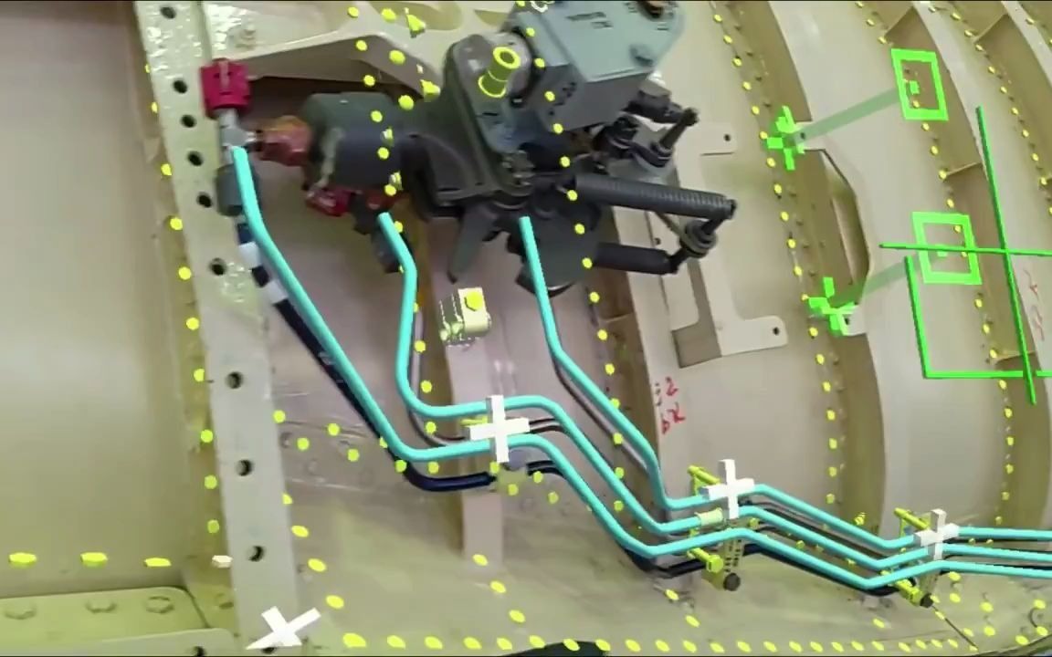 在SU57飞机生产线上使用增强现实进行装配工作-Workers on assembly line of Su-57 use augmented ...